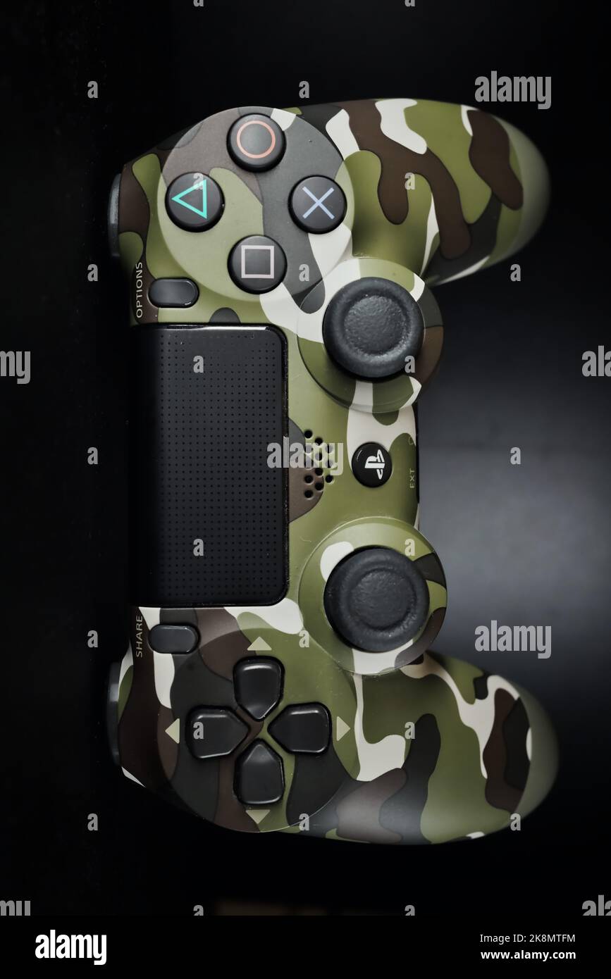A custom PS4 game console controller on a dark bakground Stock Photo ...