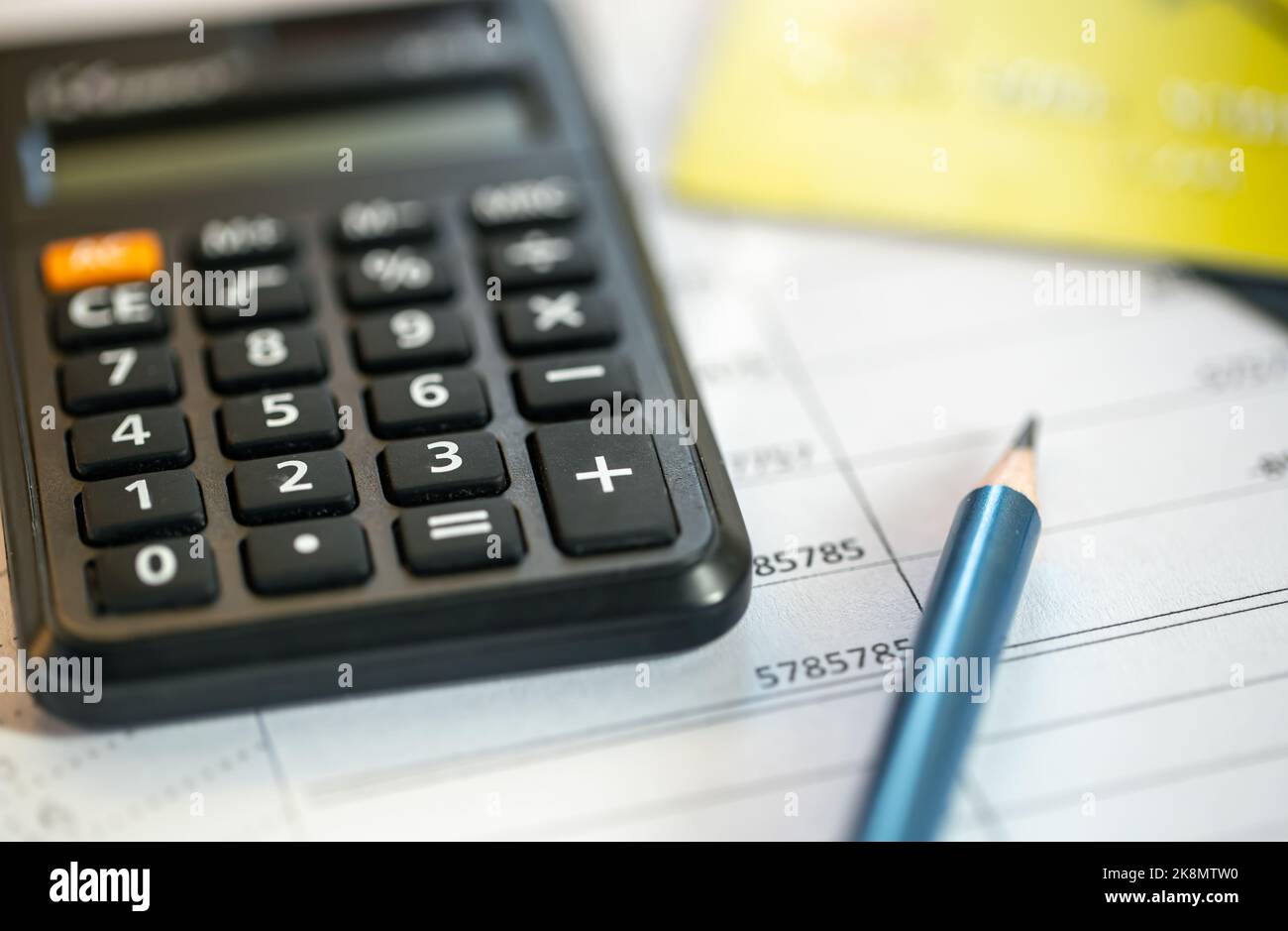 Calculator and numbers on paper closeup, finance concept Stock Photo ...
