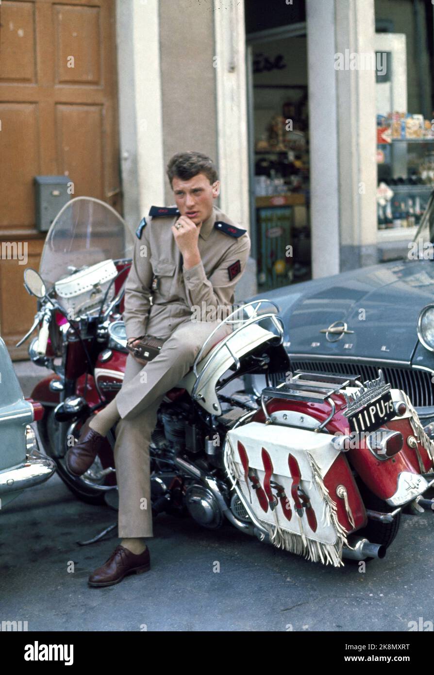 French singer Johnny Hallyday seated on his Harley Davidson during his ...