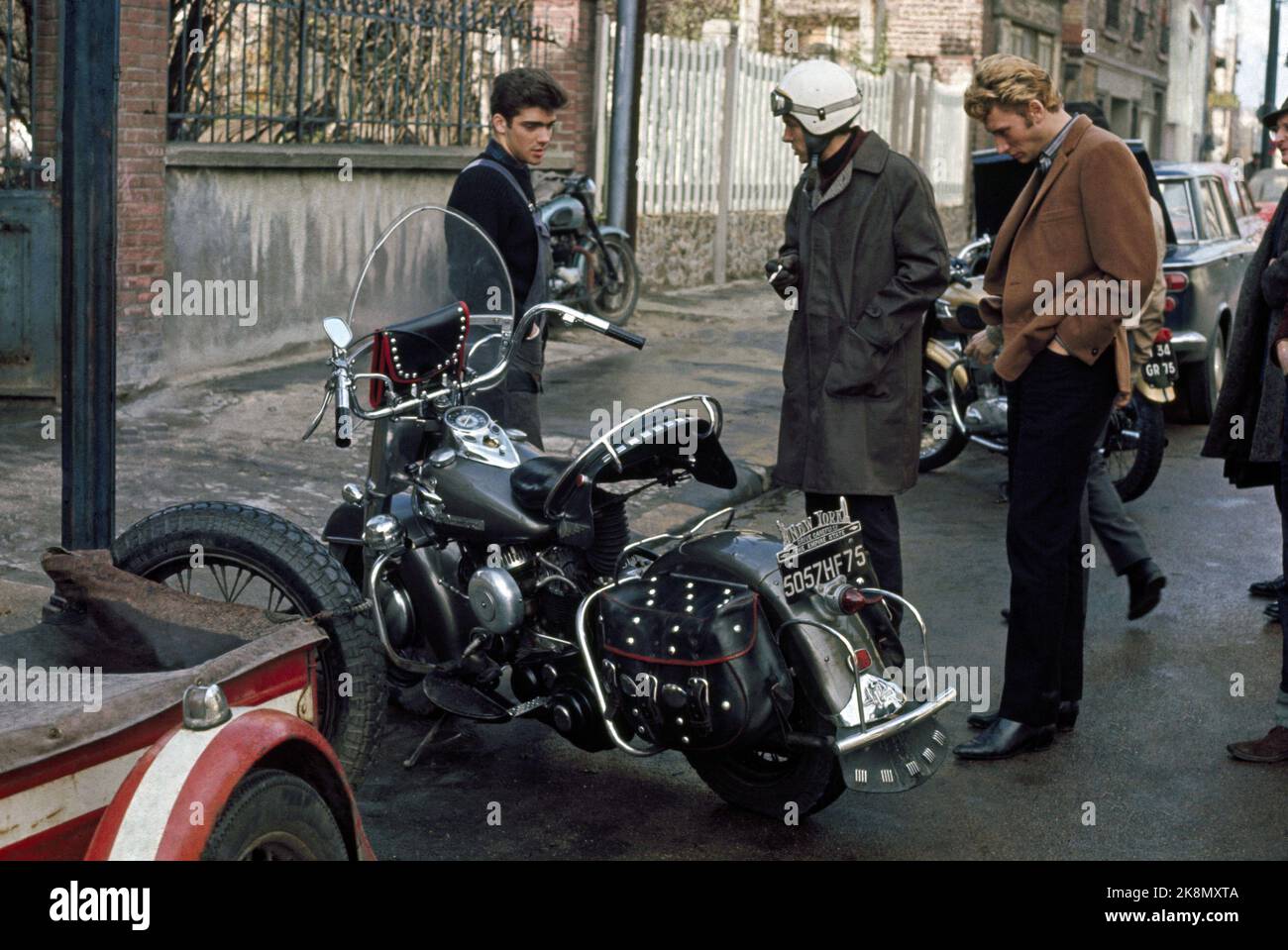 French singer Johnny Hallyday buying a Harley Davidson near Paris. 1964 ...