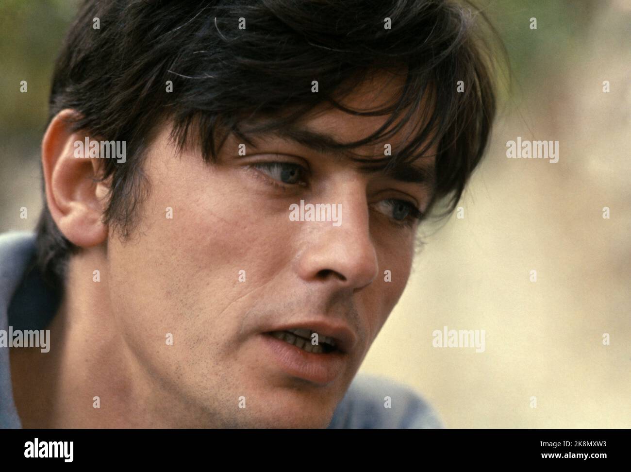 Alain Delon on the set of the film 'Diaboliquement Vôtre' (directed by ...