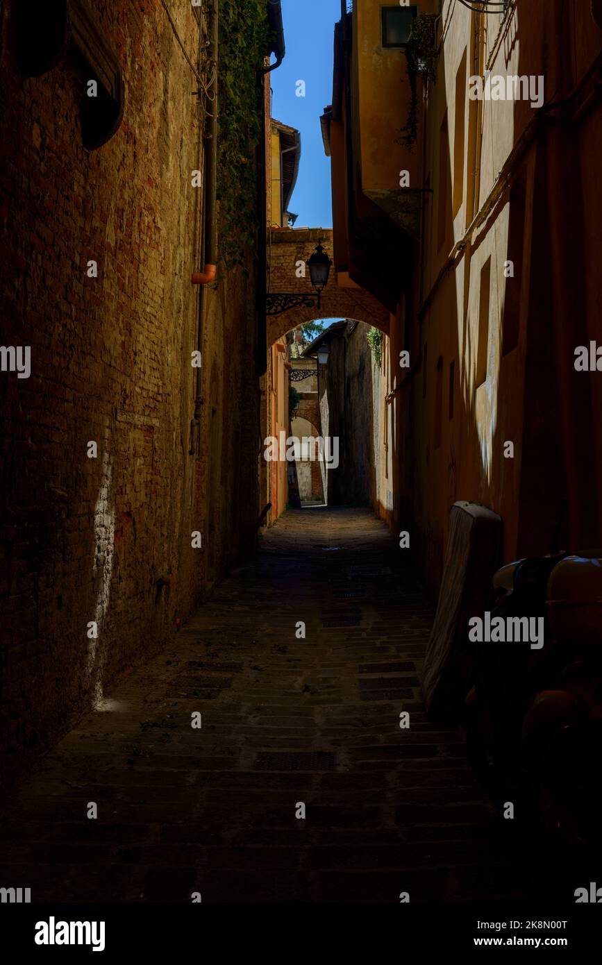 View of a corridor in a town Stock Photo - Alamy