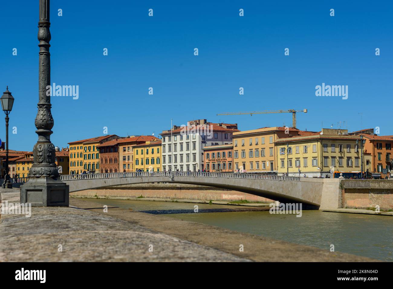 View of a bridge over river arno Stock Photo - Alamy