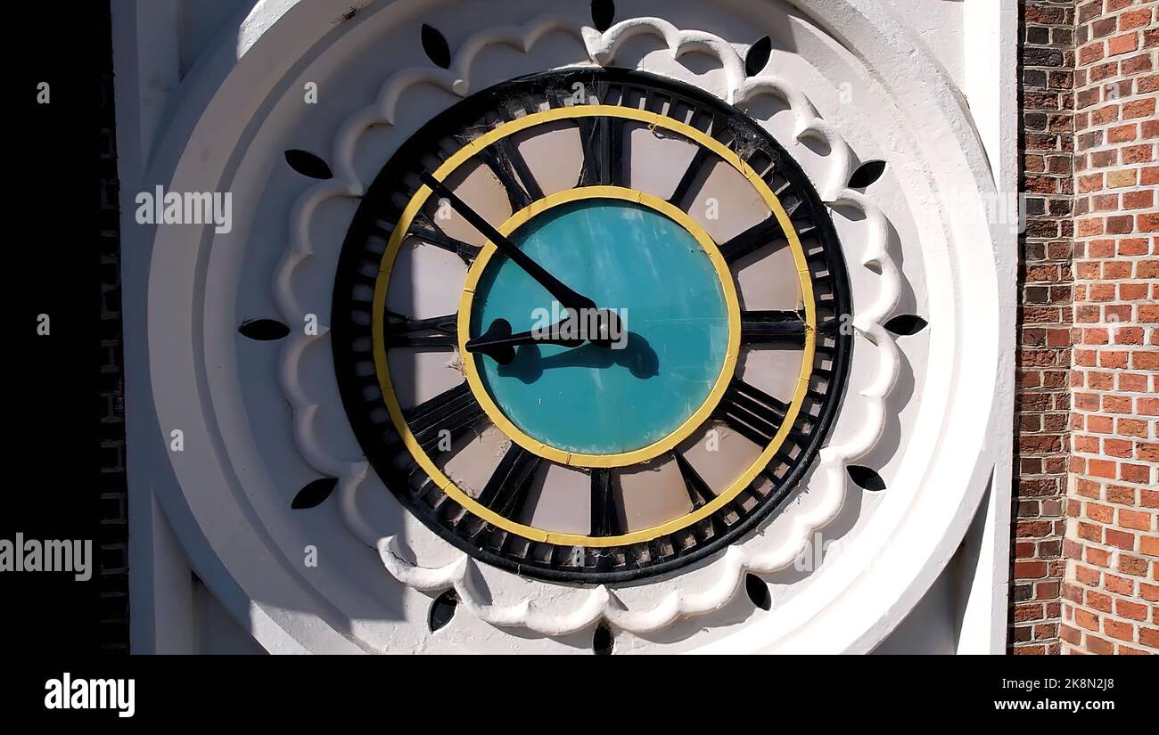 The close-up view of a medieval building's circle clock Stock Photo - Alamy