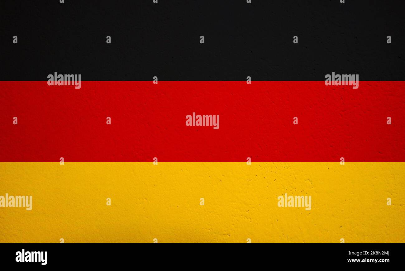 german flag on the wall as background Stock Photo - Alamy