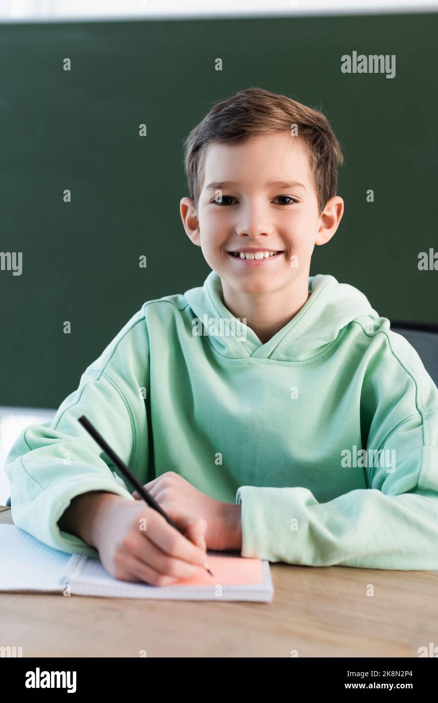 Boy girl child writing home preteen hi-res stock photography and images ...