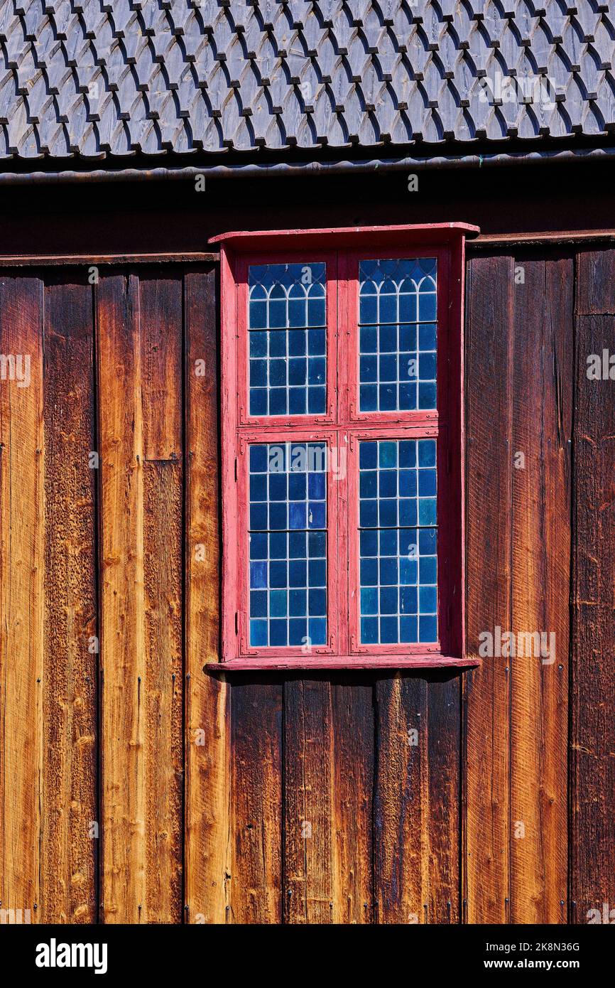 A vertical shot of the wooden wall of the Ringebu Stave Church with a ...