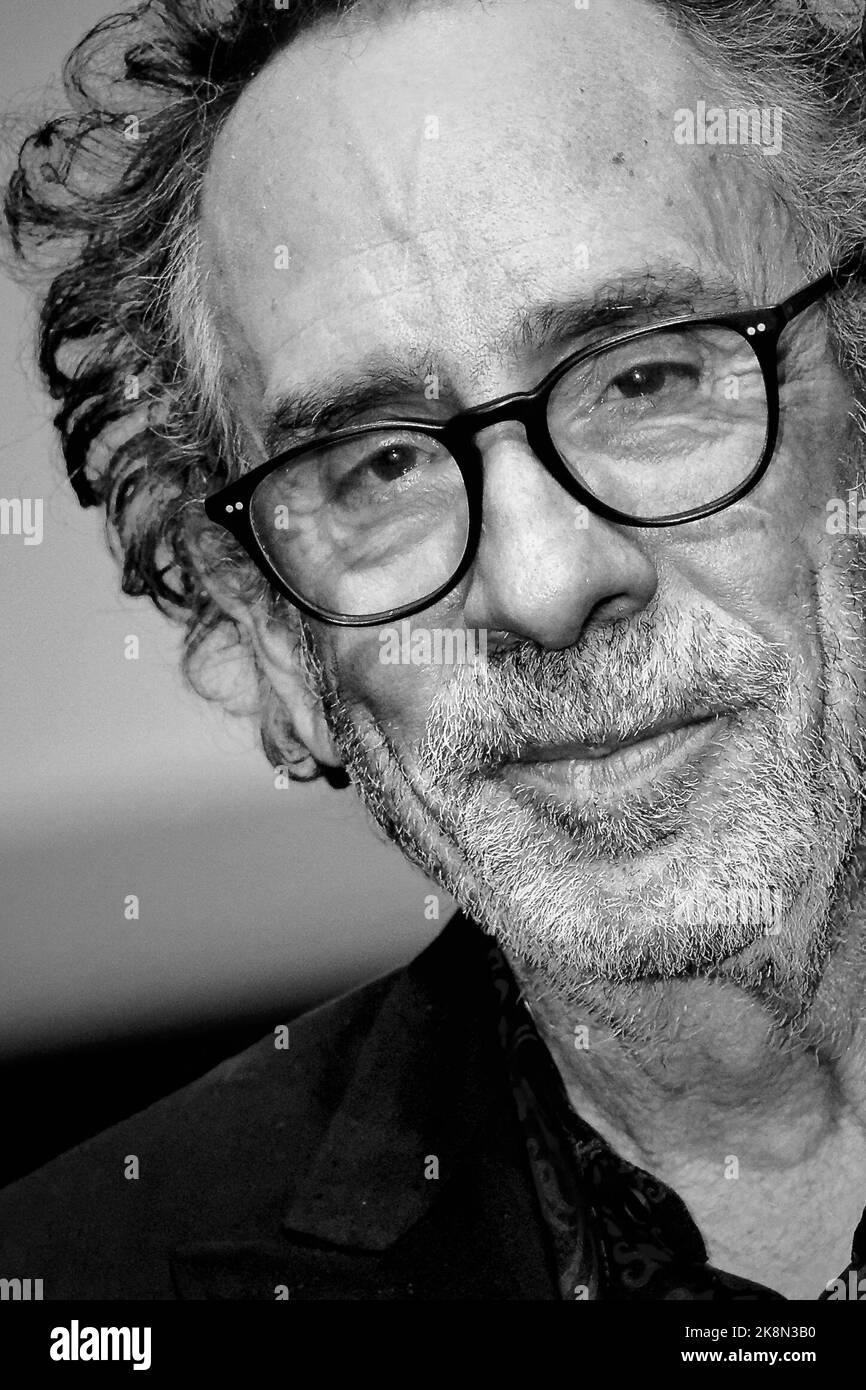 Tim Burton acknowledges the audience onstage the Lumiere Award ceremony ...