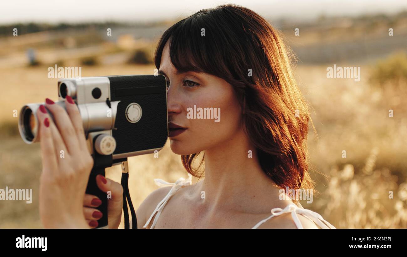 Filming with super8 vintage camera Stock Photo - Alamy