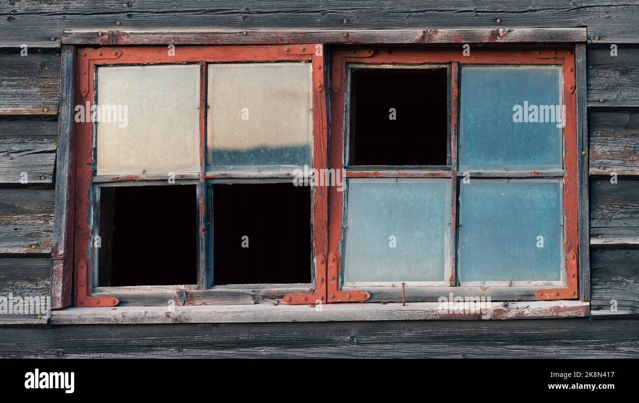 An old window of a wooden barn wall Stock Photo - Alamy