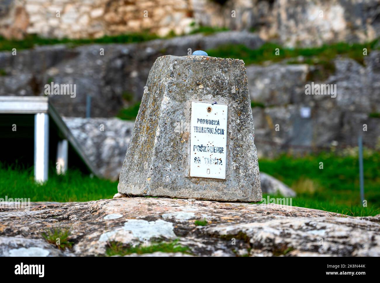 old triangulation point on a stone at the Spiš Castle in Slovakia Stock ...