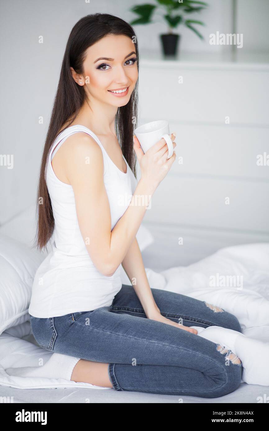Good morning. Portrait of a smiling pretty young brunette woman ...