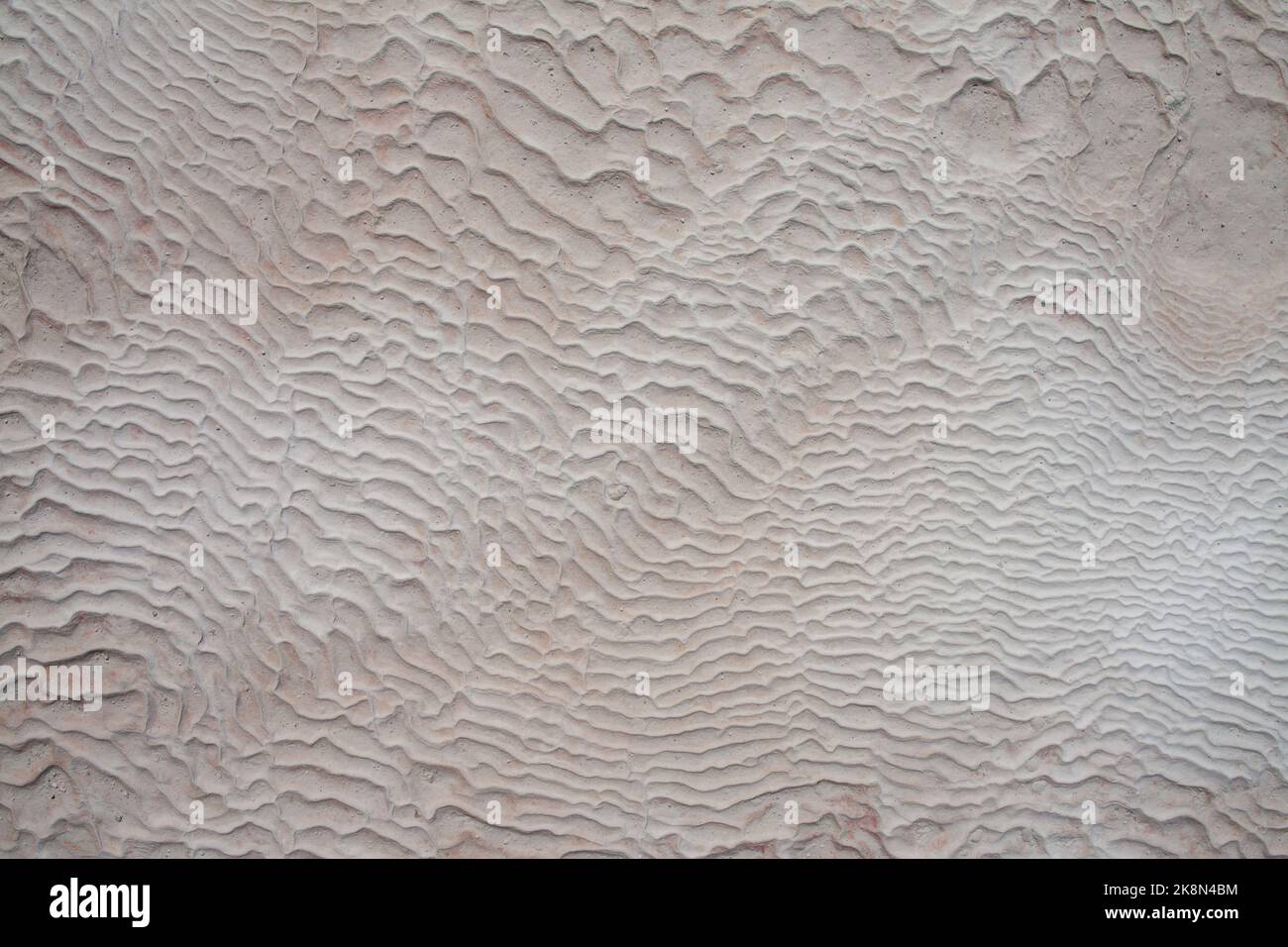 Background of natural white wall Pamukkale calcium travertine in Turkey ...