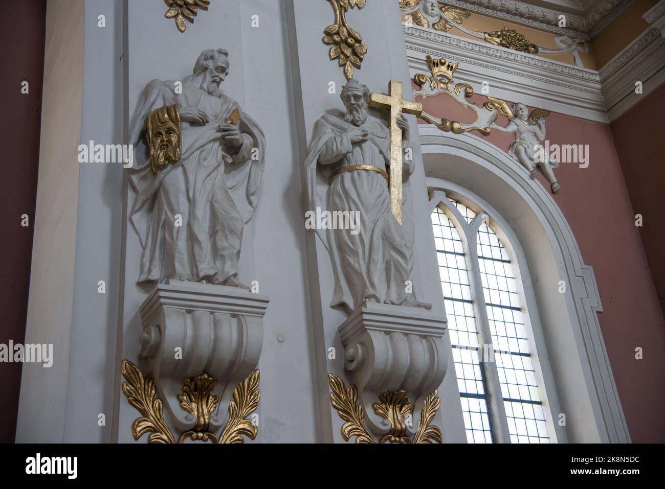A low-angle view of the bible character statues on the walls of a ...