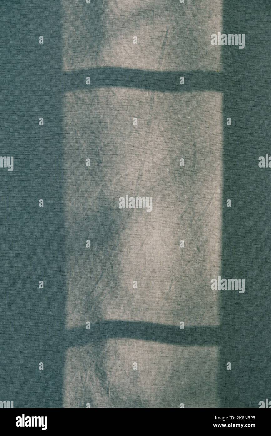 curtain with shadows from the window Stock Photo - Alamy