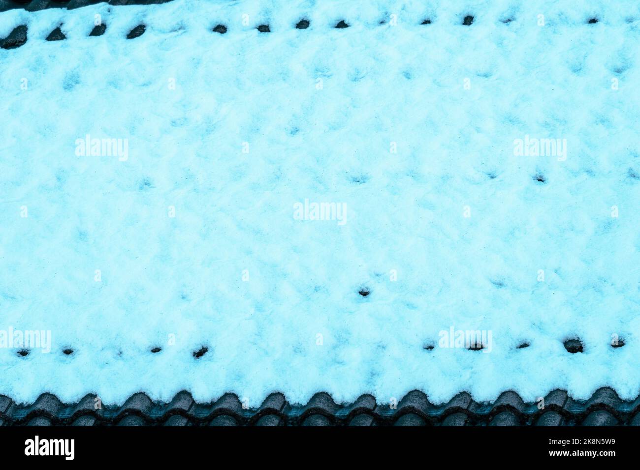 Snow on roof tiles Stock Photo - Alamy
