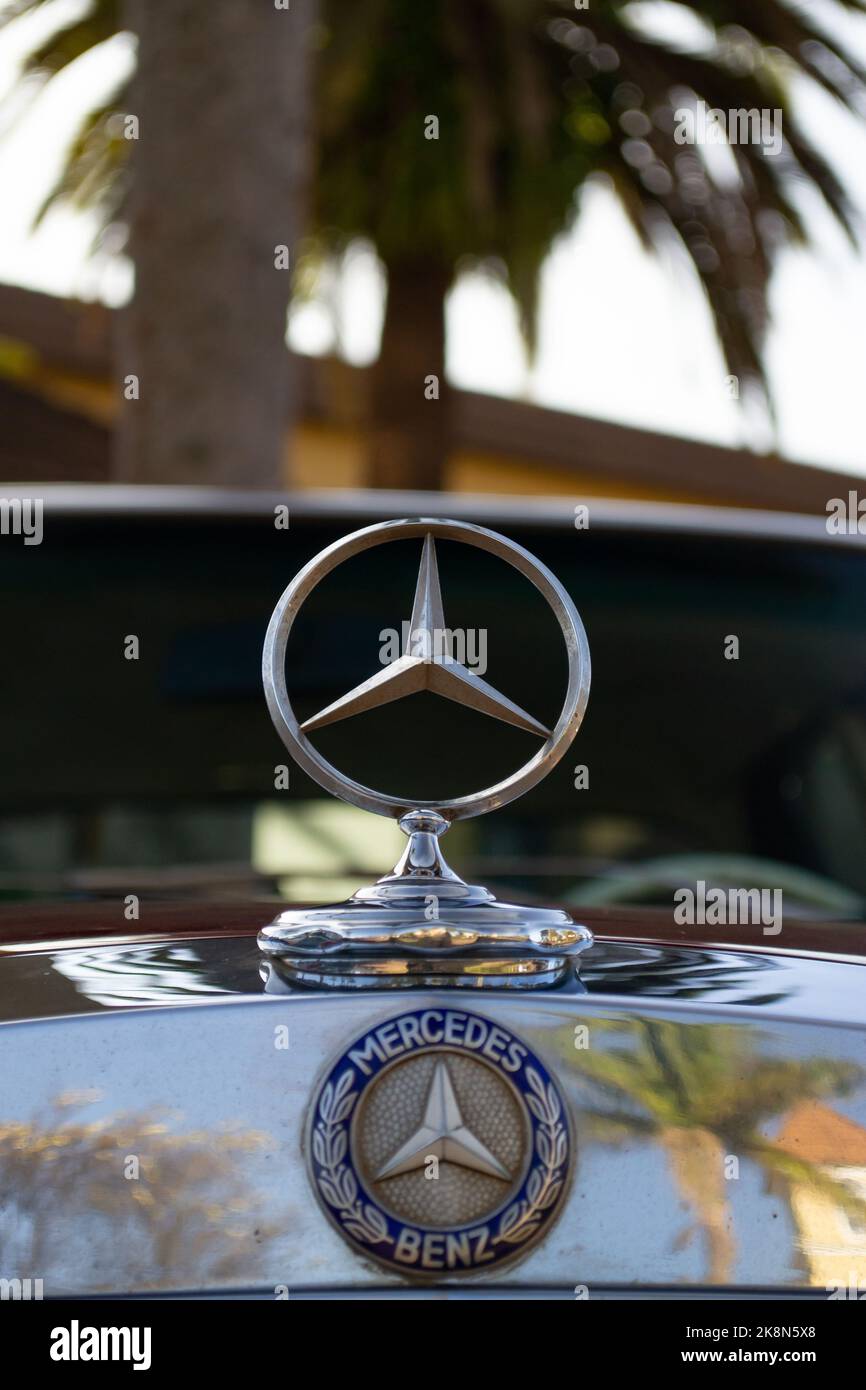 The vertical close-up view of a Mercedes Benz classic car frontal logo ...