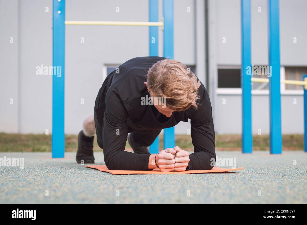 Professional athlete tries to stay in the plank position as long as ...