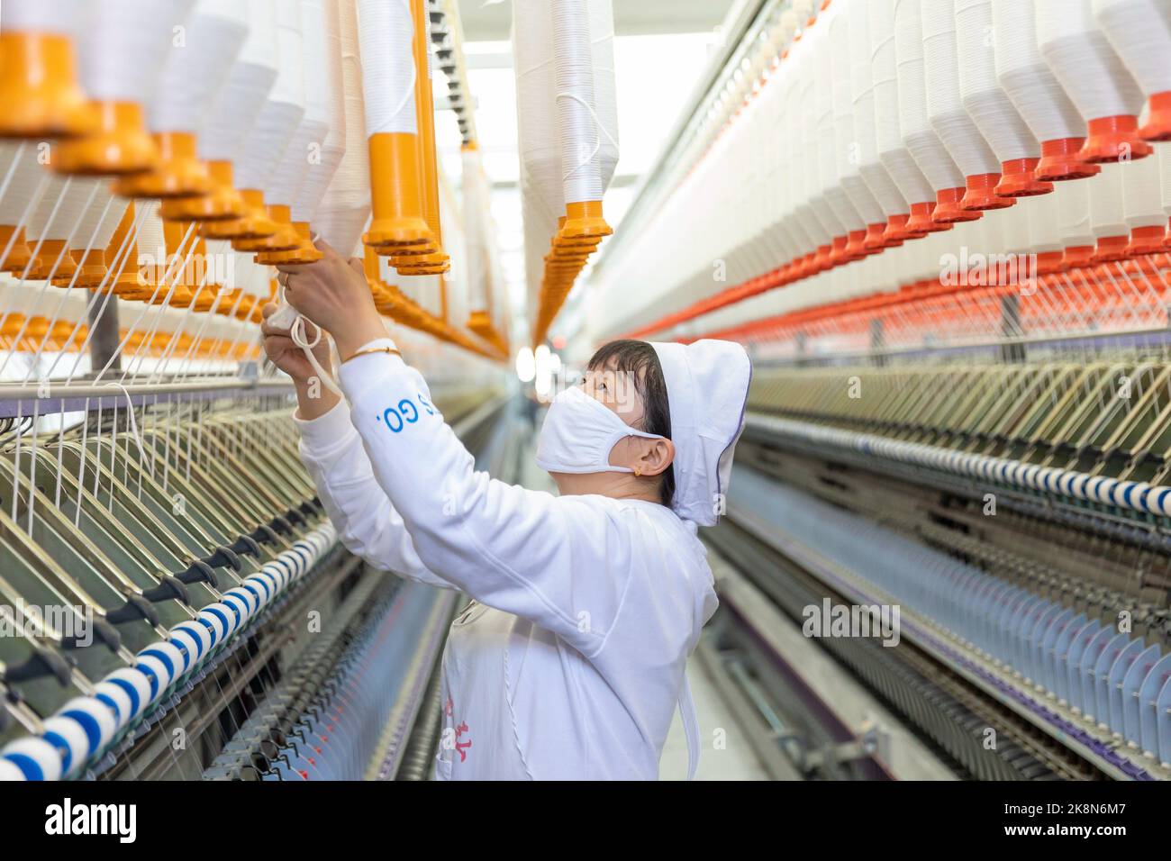 NANTONG, CHINA - OCTOBER 24, 2022 - Workers at a textile company rush ...