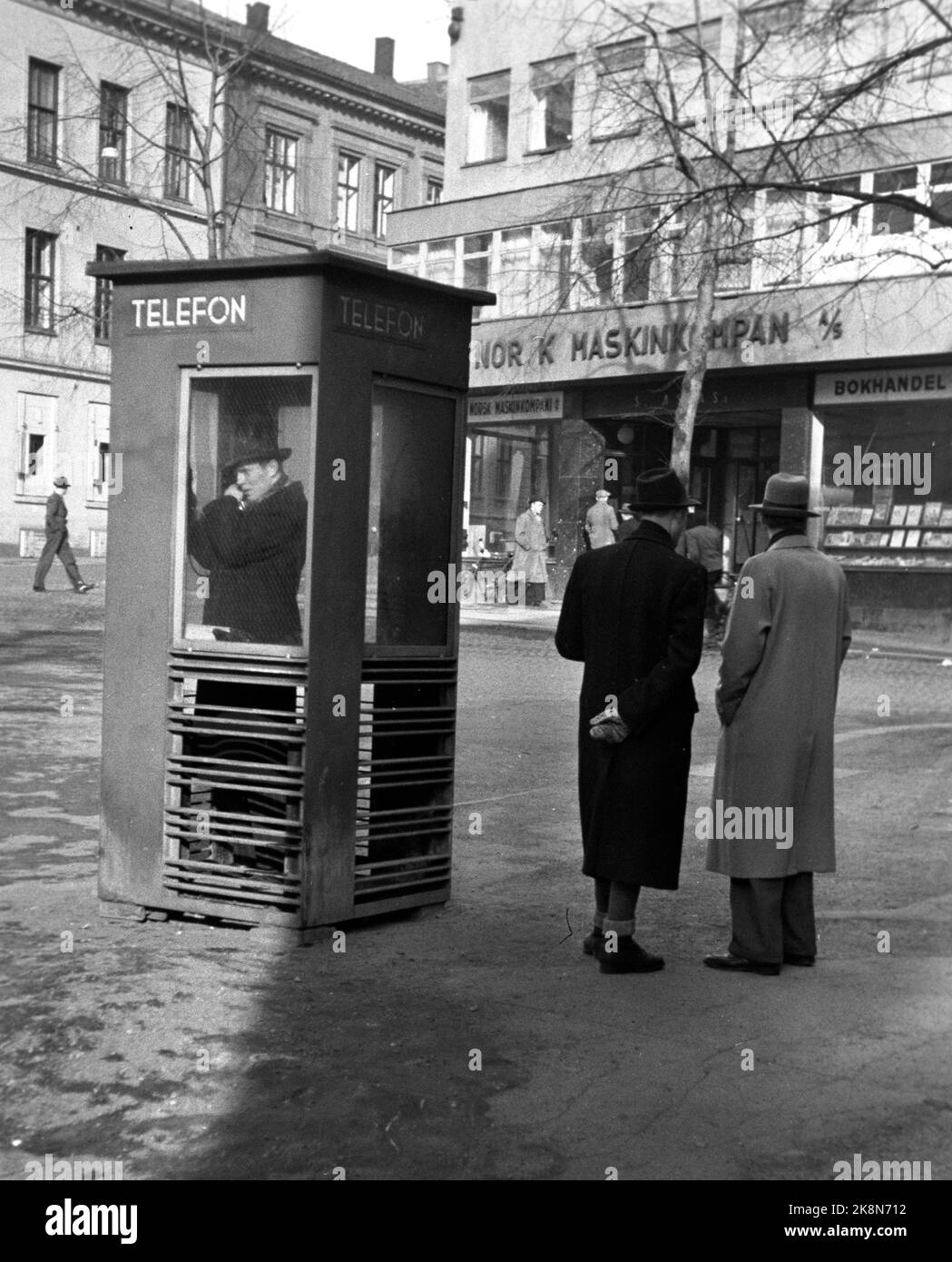 WW2 Oslo 19440322 A telephone booth at St. Olav's place. Photo: NTB ...