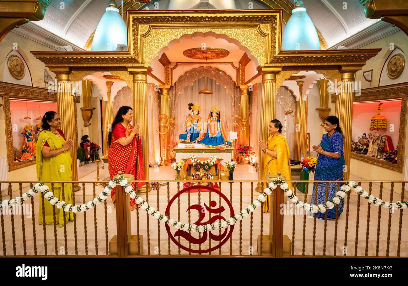 Hindu devotees pray at the Veda Mandir Hindu temple in Bolton during ...
