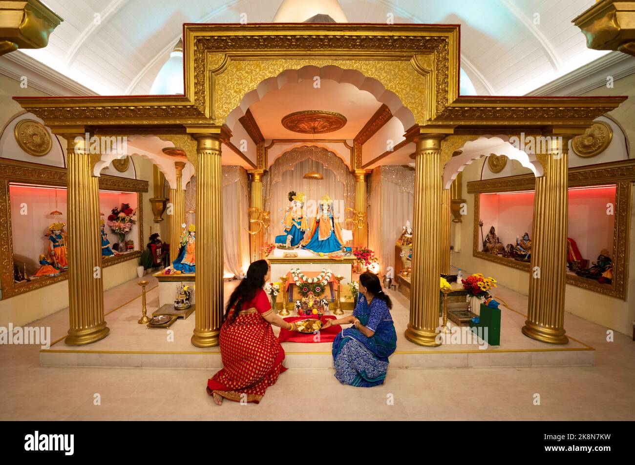 Hindu devotees pray at the Veda Mandir Hindu temple in Bolton during ...