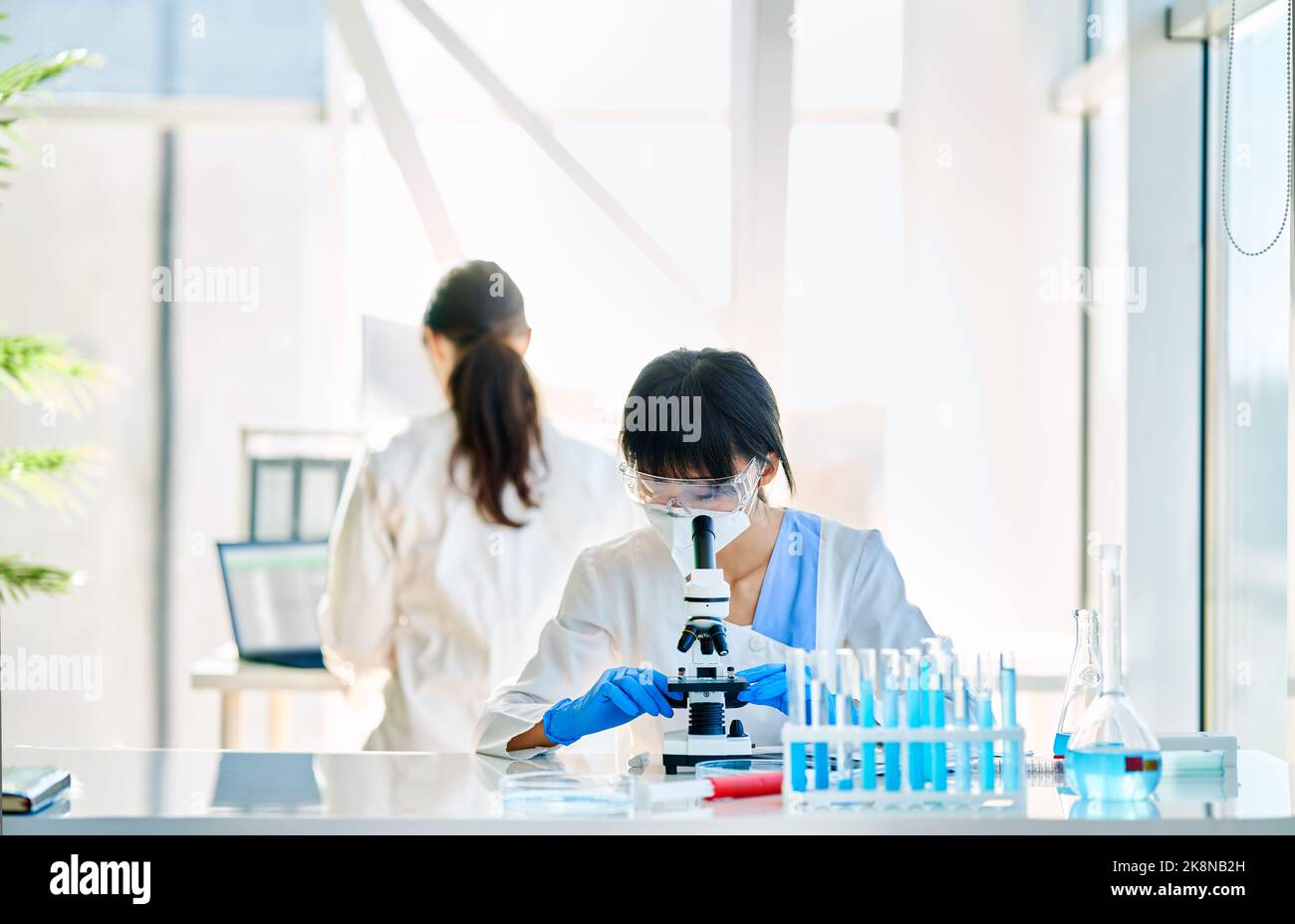 Scientific research team working at modern medical science laboratory ...