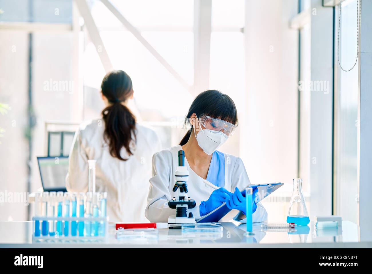 Scientific research team working at modern medical science laboratory ...