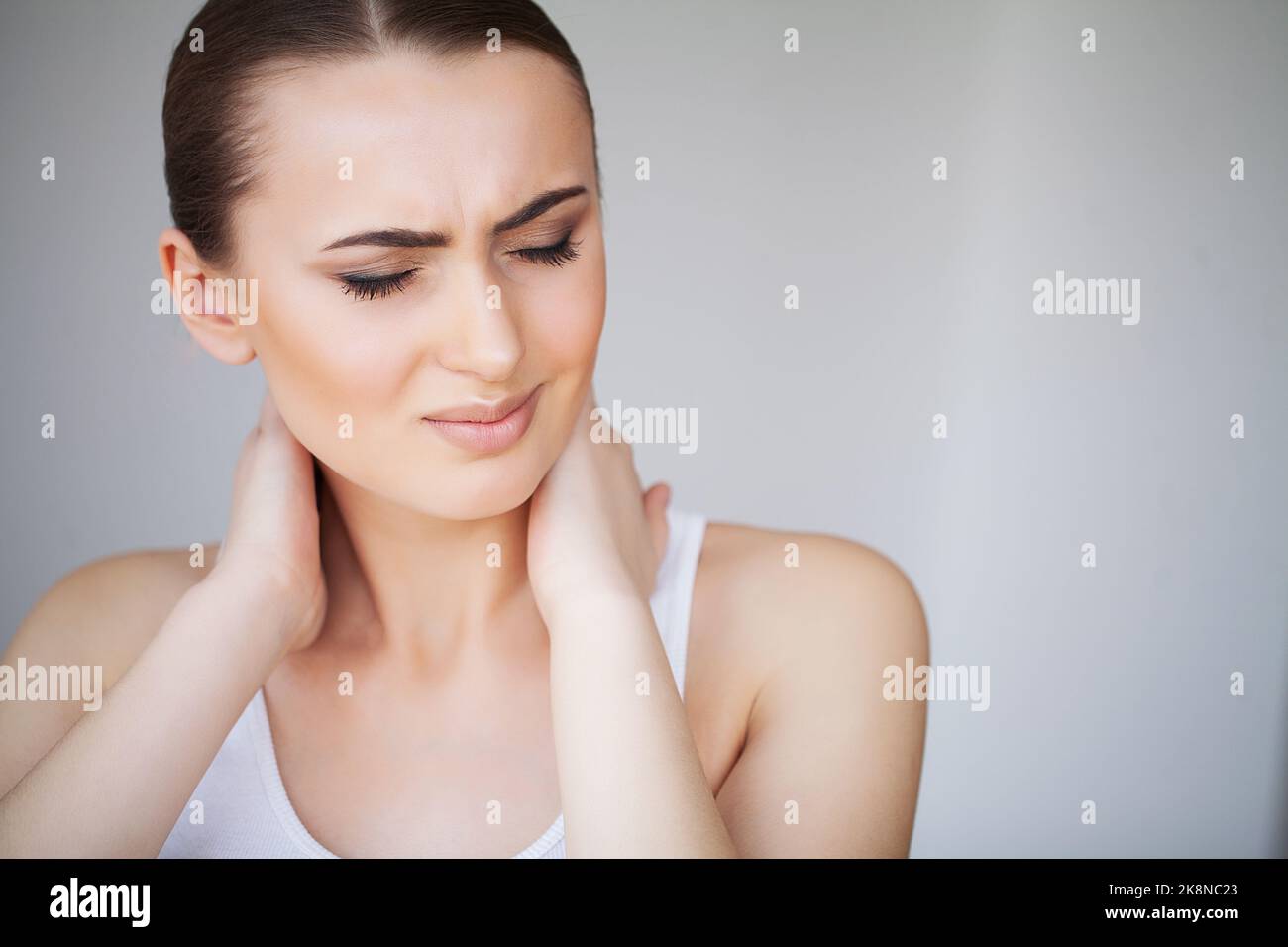 Pain. Beautiful Young Woman Feeling Sick and Has a Pain in the Neck ...