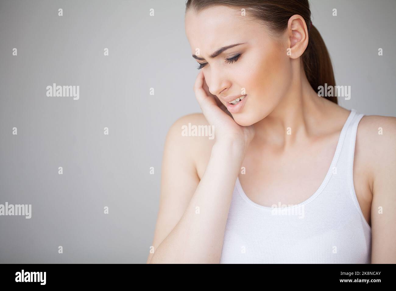 Tooth Pain. Woman Feeling Tooth Pain. Closeup Of Beautiful Sad Girl ...