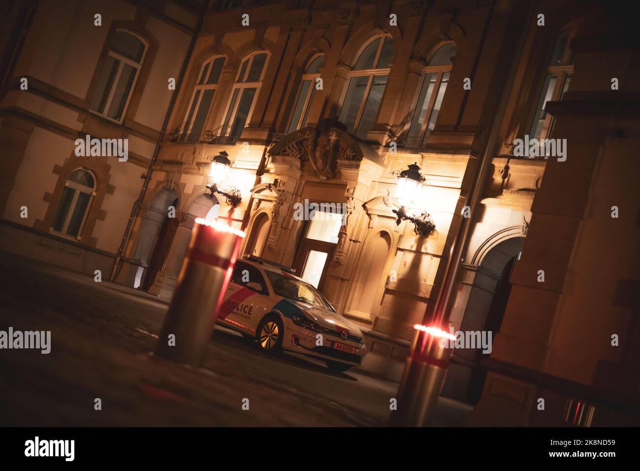 A police car in front of the building in Luxembourg at night Stock ...