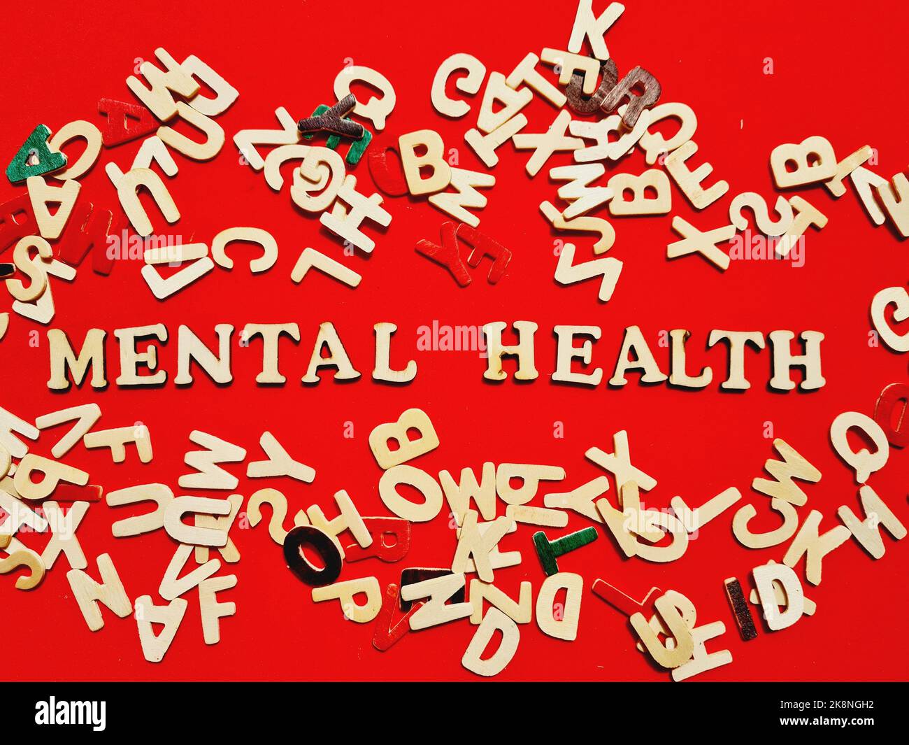 A mental health lettering on the red background, concept of mental ...