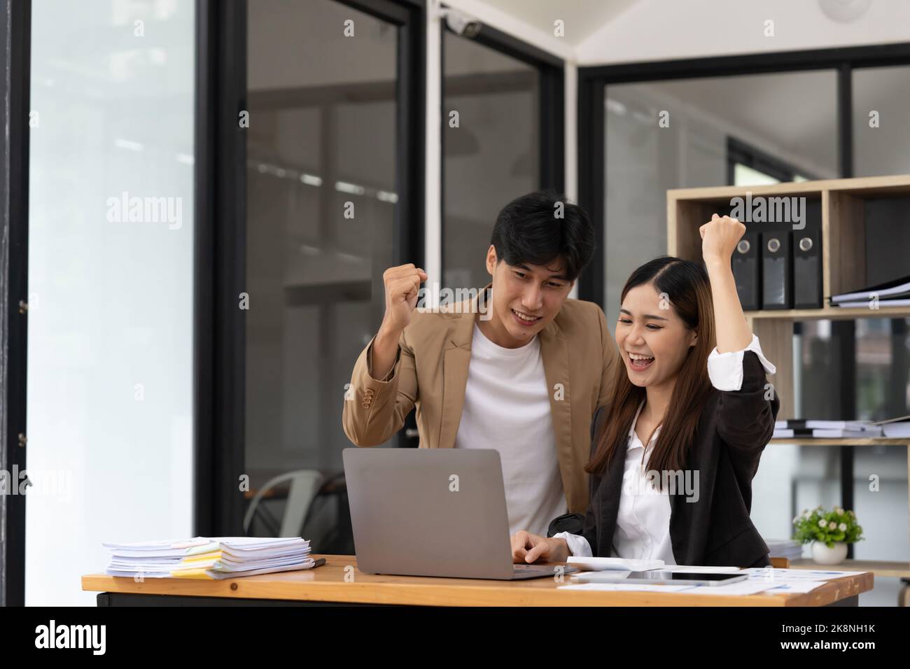 Successful entrepreneurs and business asian people achieving goals ...