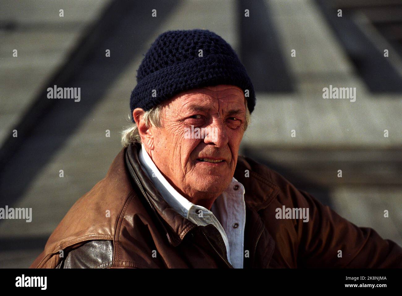 Oslo 19950418 Erik Bye is interviewed at Aker Brygge. Portrait with hat ...