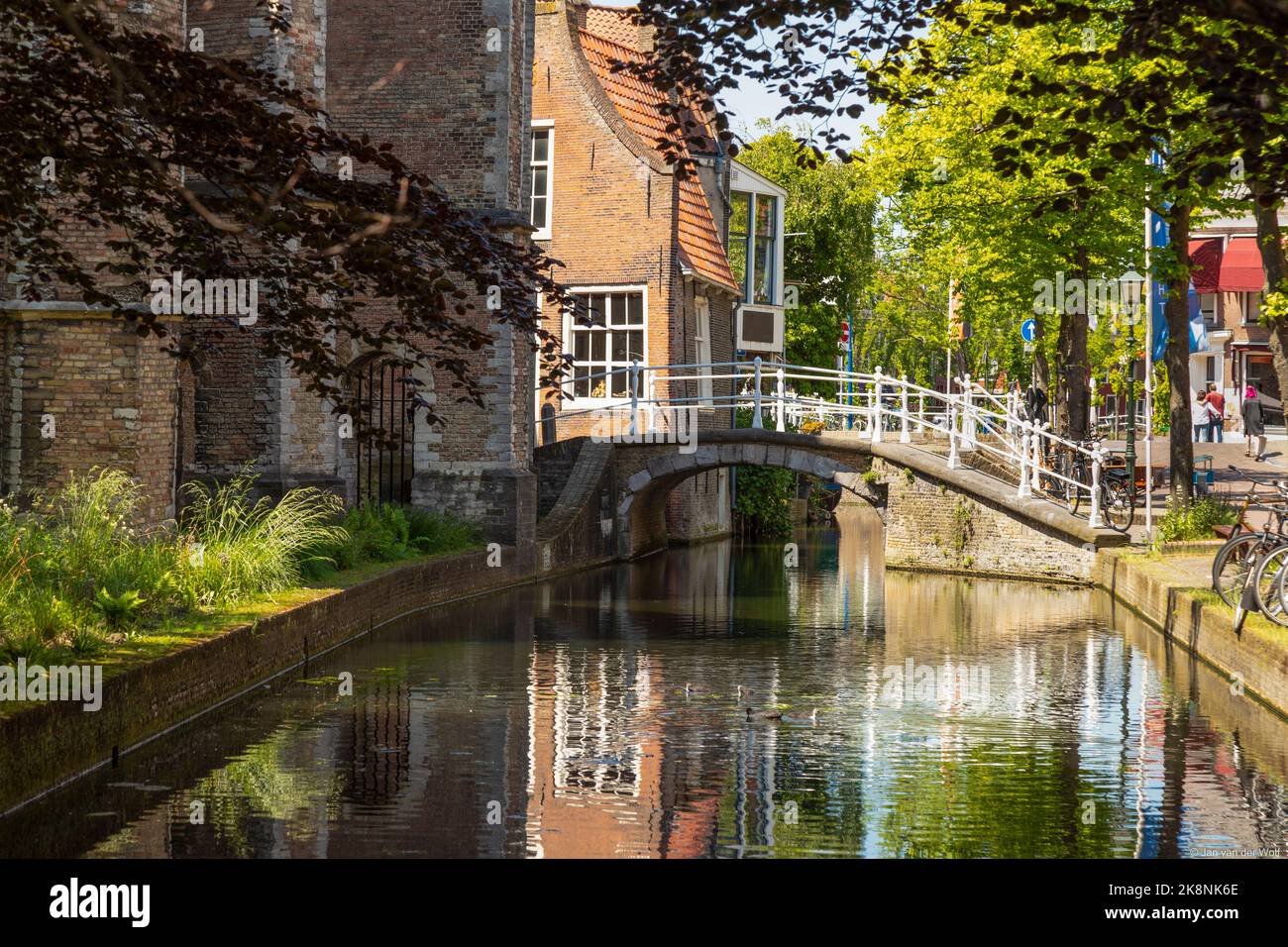 View of the white bridge over the canal in the city center of the ...