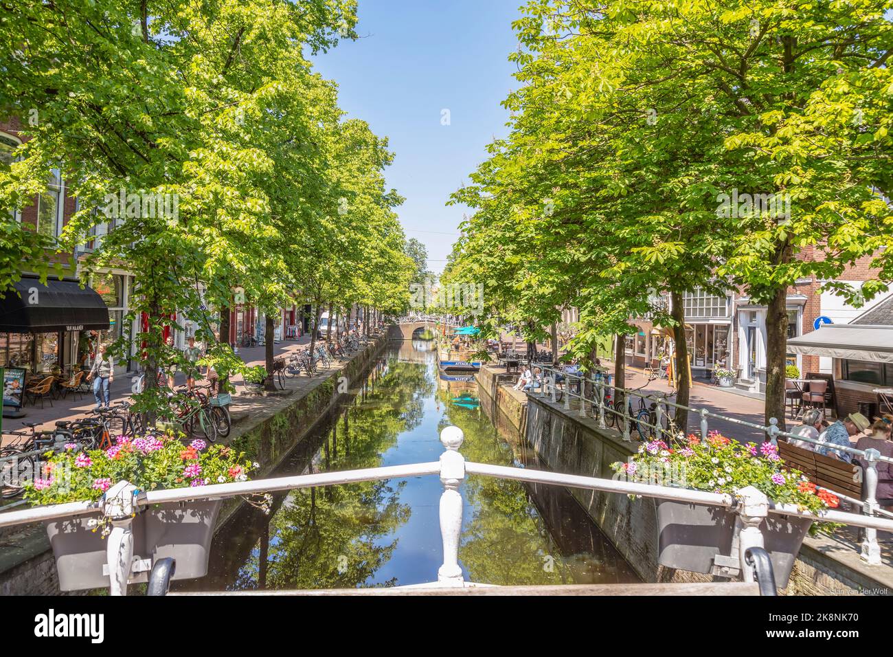 Residents and tourists enjoy themselves along the narrow canal in the ...