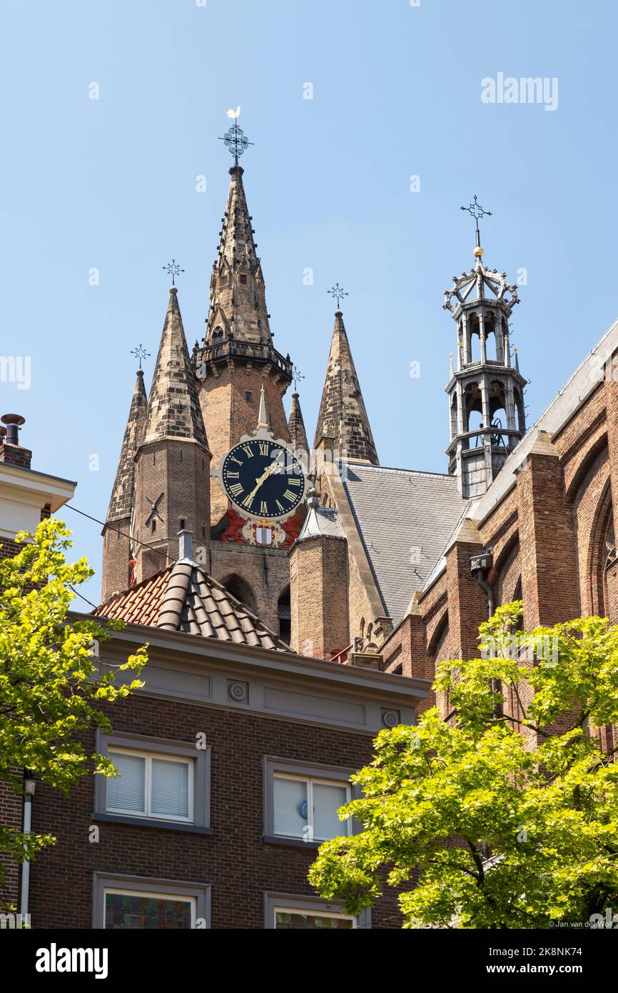 Leaning tower of the old church in the historic Dutch old town of Delft ...
