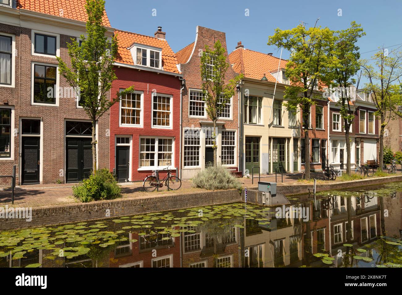 Colorful canal houses in the center of Delft in the Netherlands Stock ...