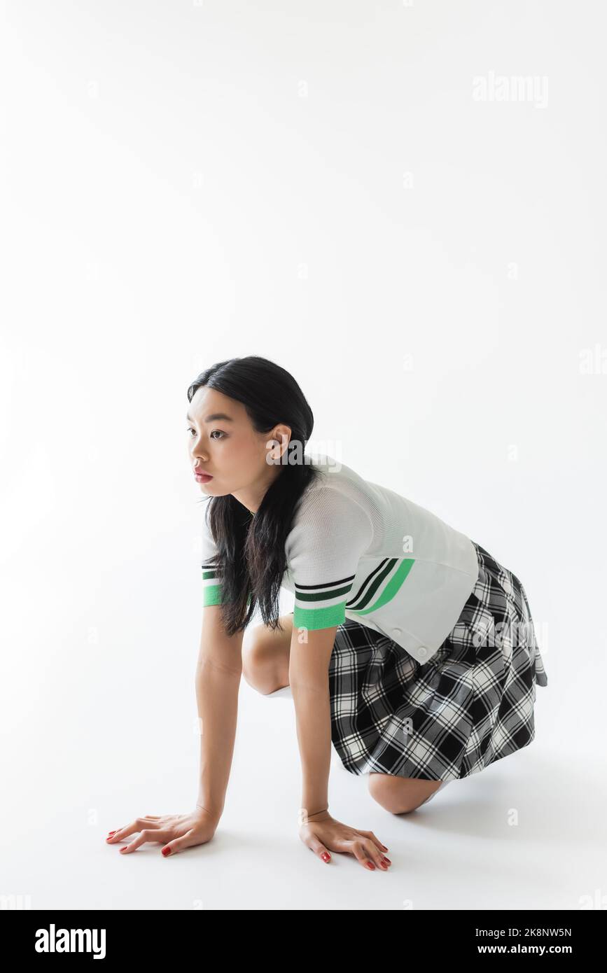 Kneeling model hi-res stock photography and images - Alamy