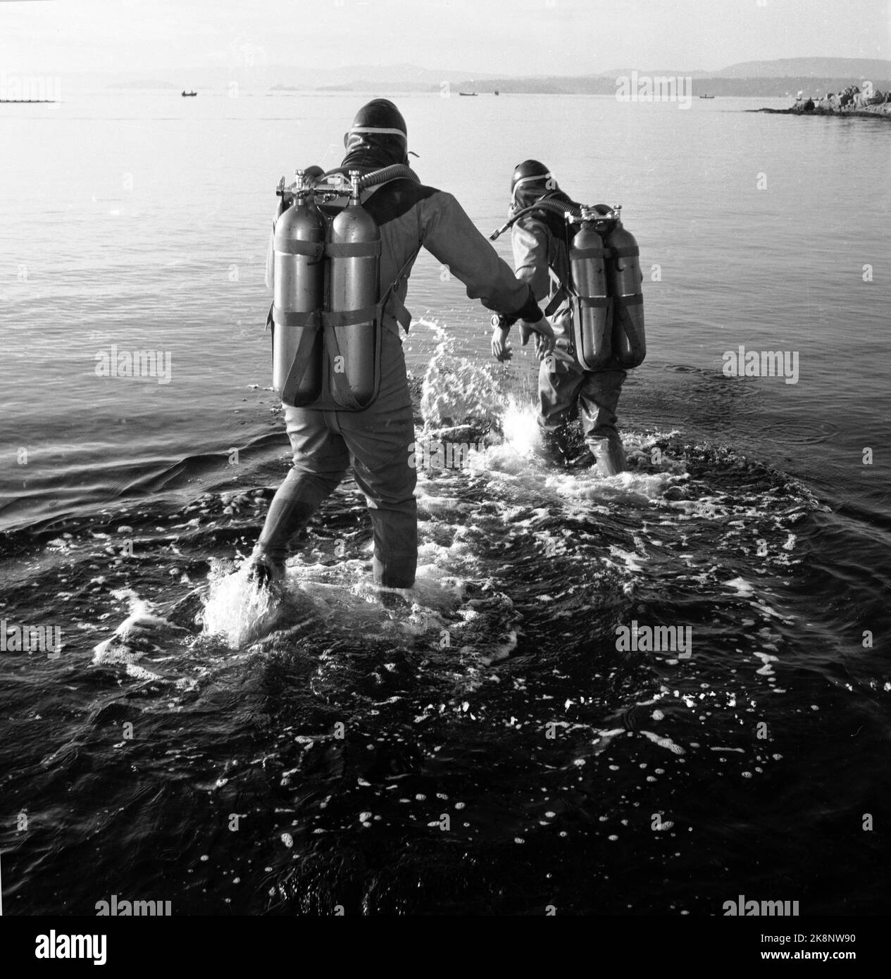 Two personnel work in Black and White Stock Photos & Images - Alamy