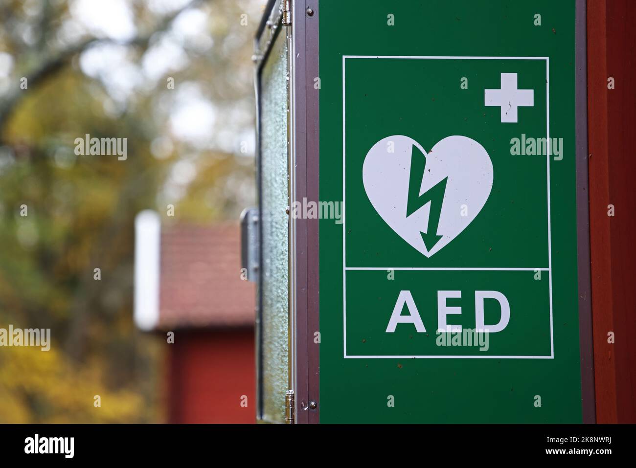 An Automated external defibrillator in a park. An automated external ...