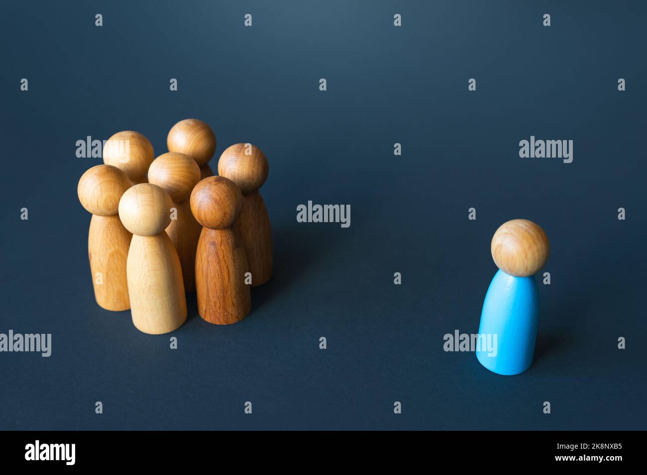 The blue man communicates with a group of people. Seeking support and ...