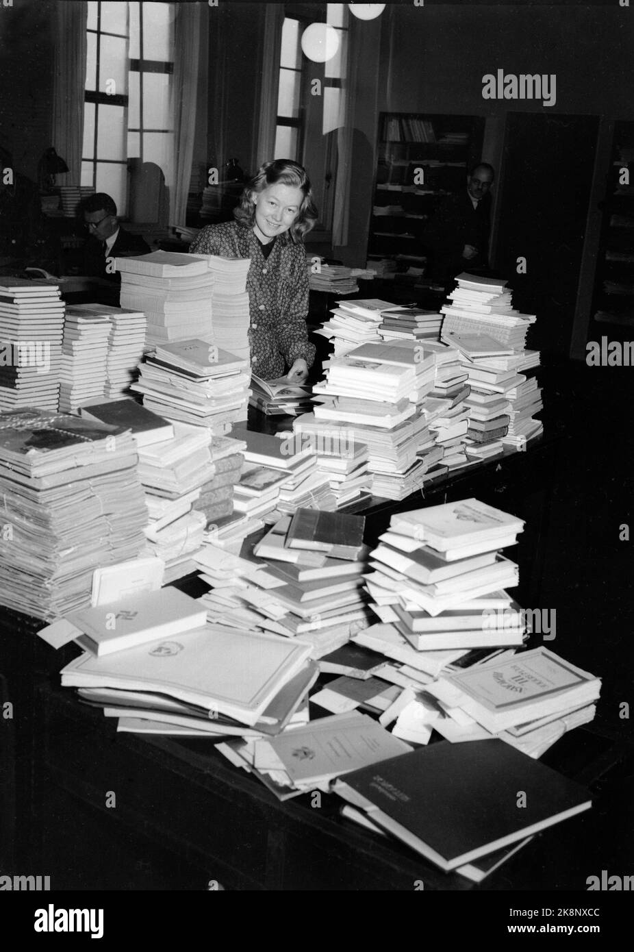 Female librarian working on books photo hi-res stock photography and ...