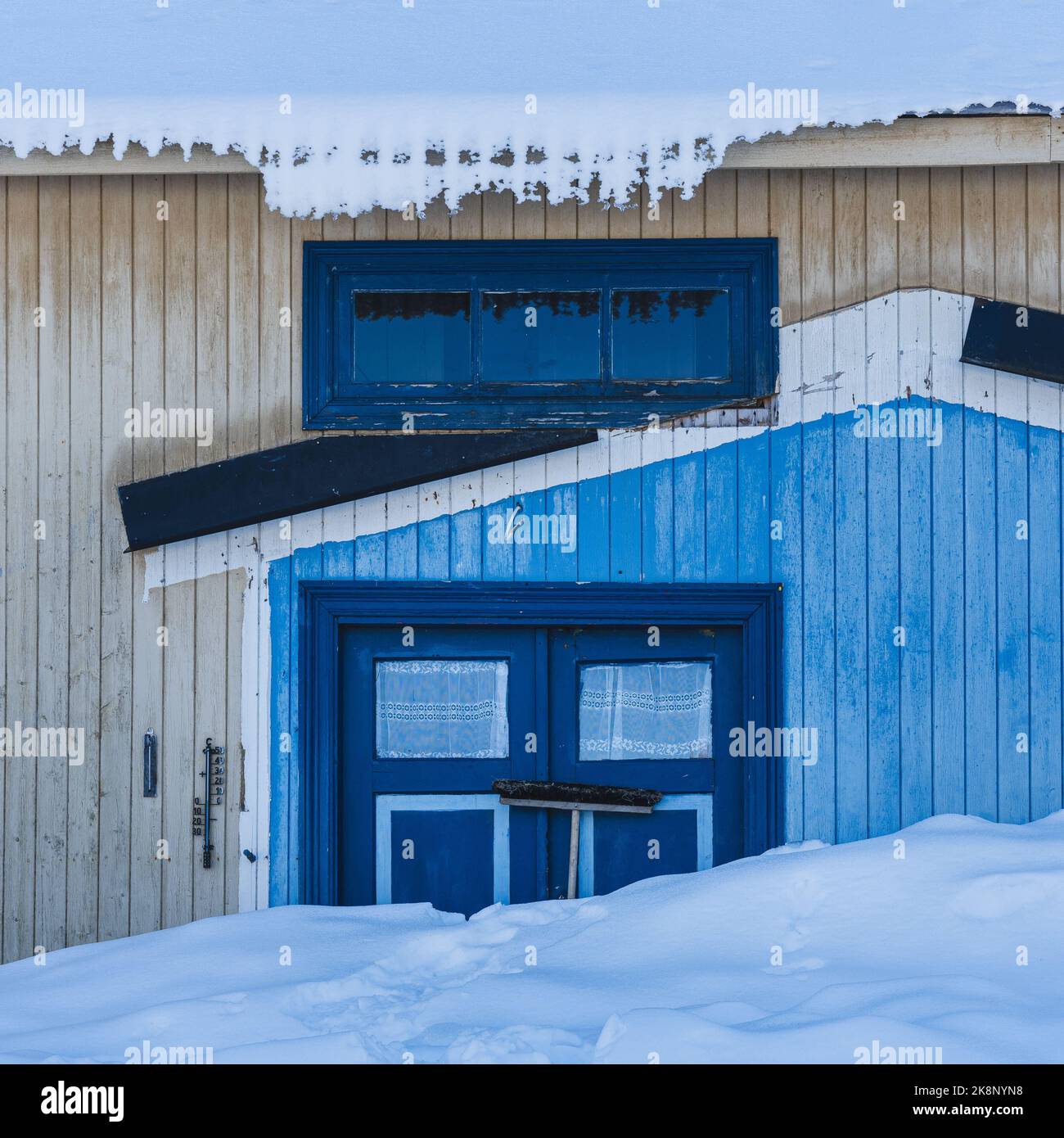 Entrance door of old house blocked by snow Stock Photo - Alamy