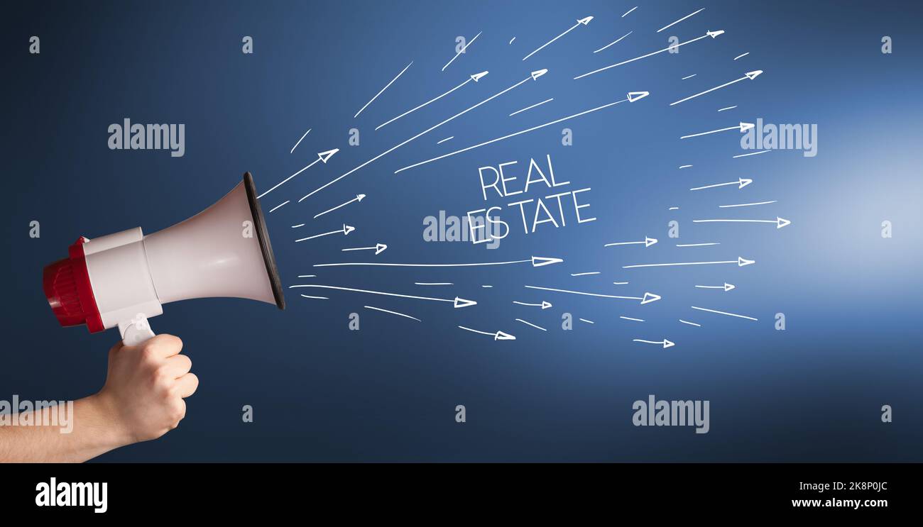 Young girl screaming to megaphone Stock Photo - Alamy