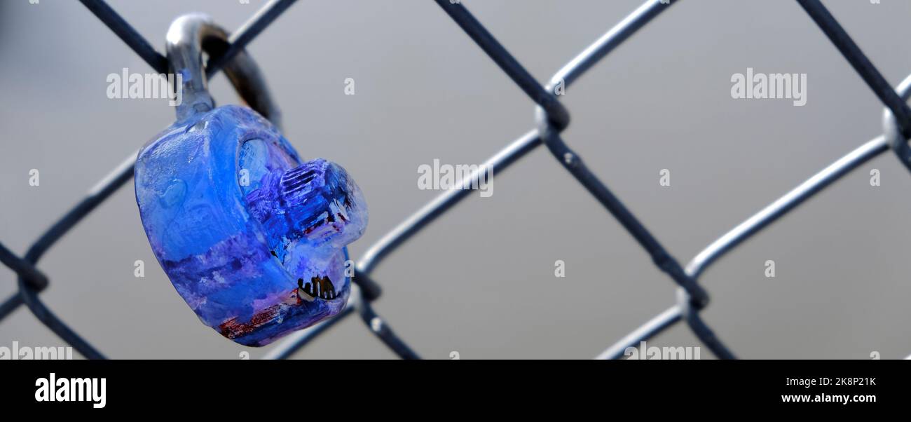 Lock on chainlink chain link fence representing commitment to love ...