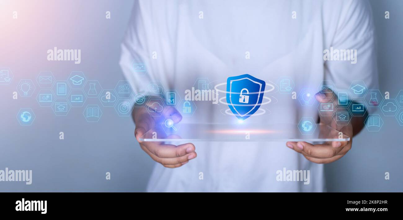 Woman holding phone tablet screen with protection icon. Represents ...