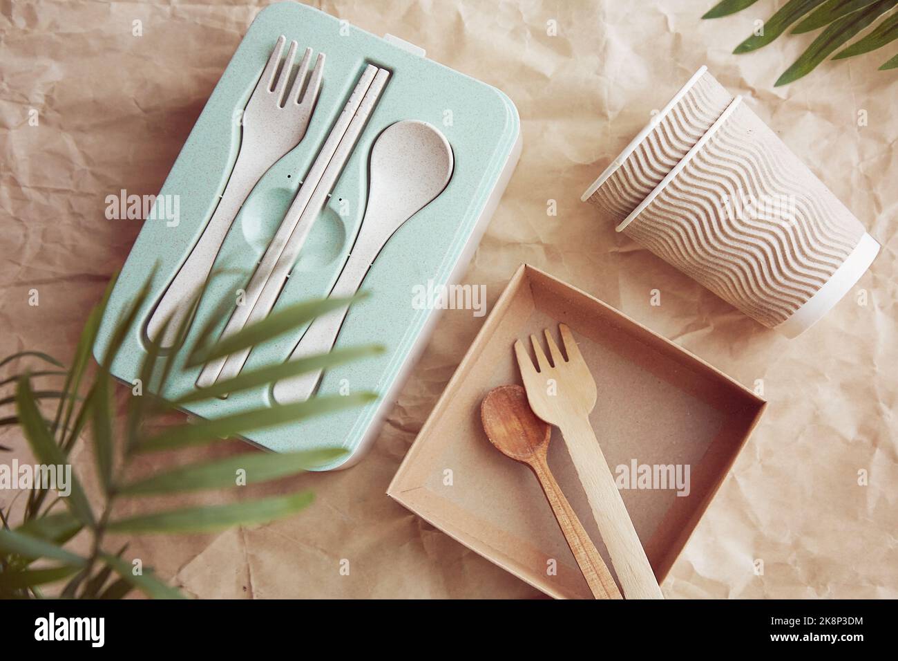 Eco-friendly, plastic free, zero waste tableware on crumpled paper ...