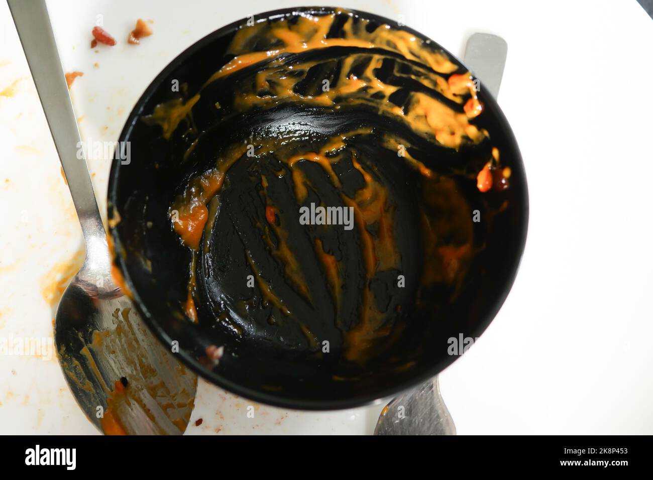 Empty plate after eating on table Stock Photo - Alamy