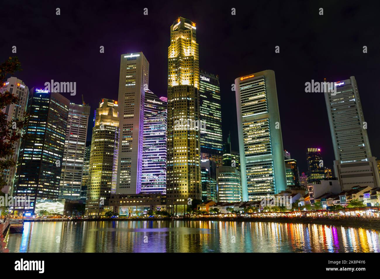 Iconic Singapore. Boat Quay at night, with the Singapore Financial ...